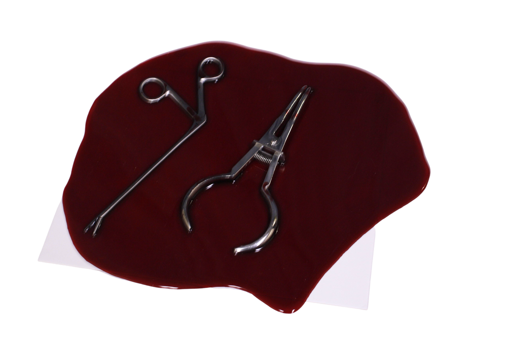 Resin Blood Pool with Medical Clamps – Dapper Cadaver Props