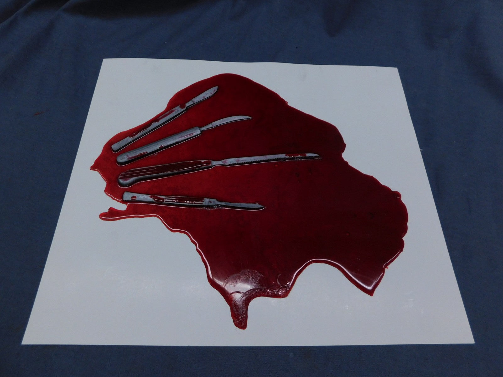 Blood Pool with Replica Scalpels – Dapper Cadaver Props